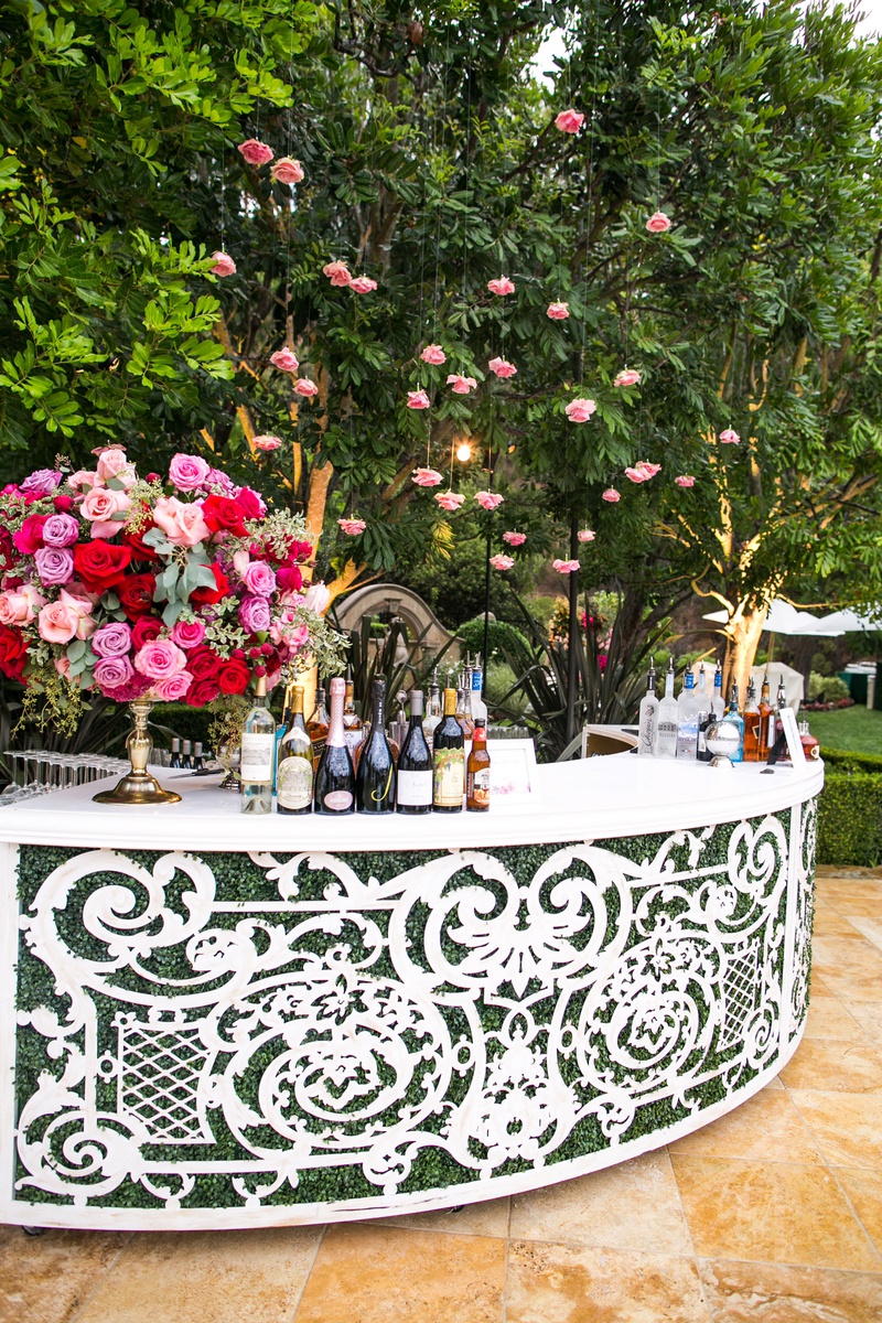 Reception Décor Photos - Curved Wedding Bar with Greenery - Inside Weddings