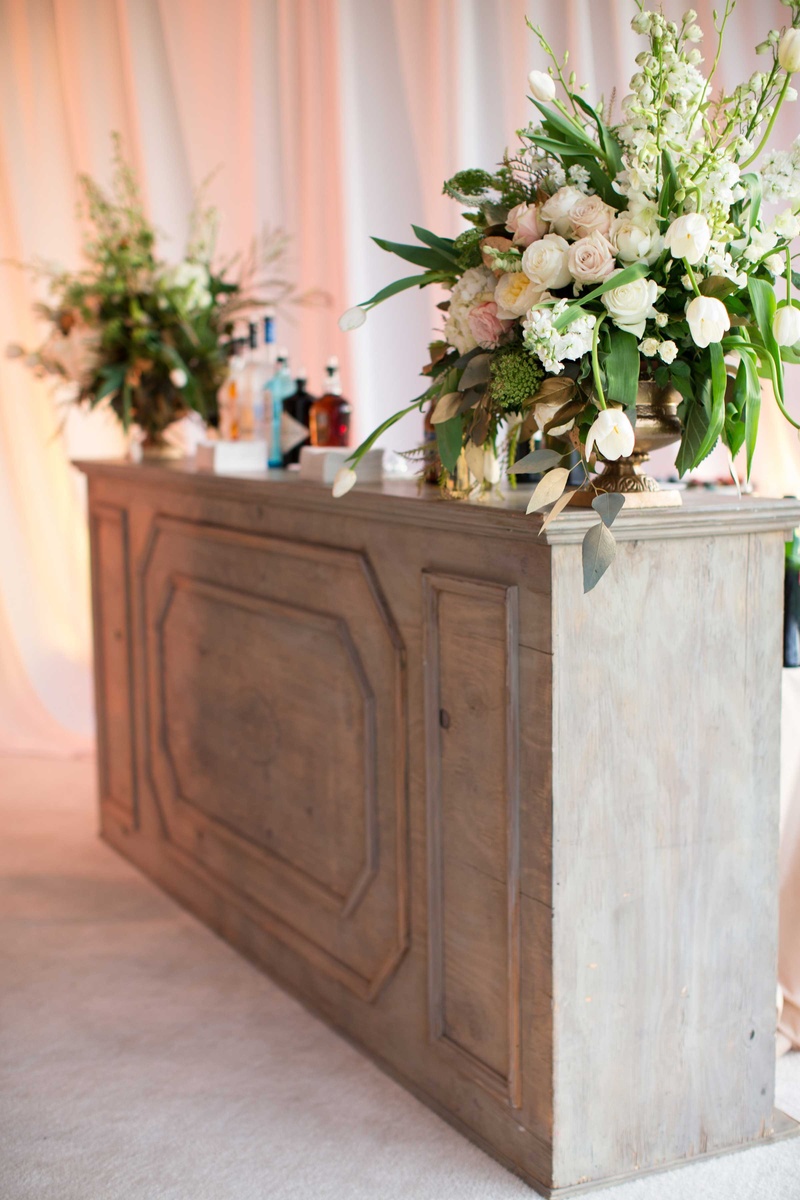 Reception Décor Photos - Rustic Wedding Bar in Tent - Inside Weddings