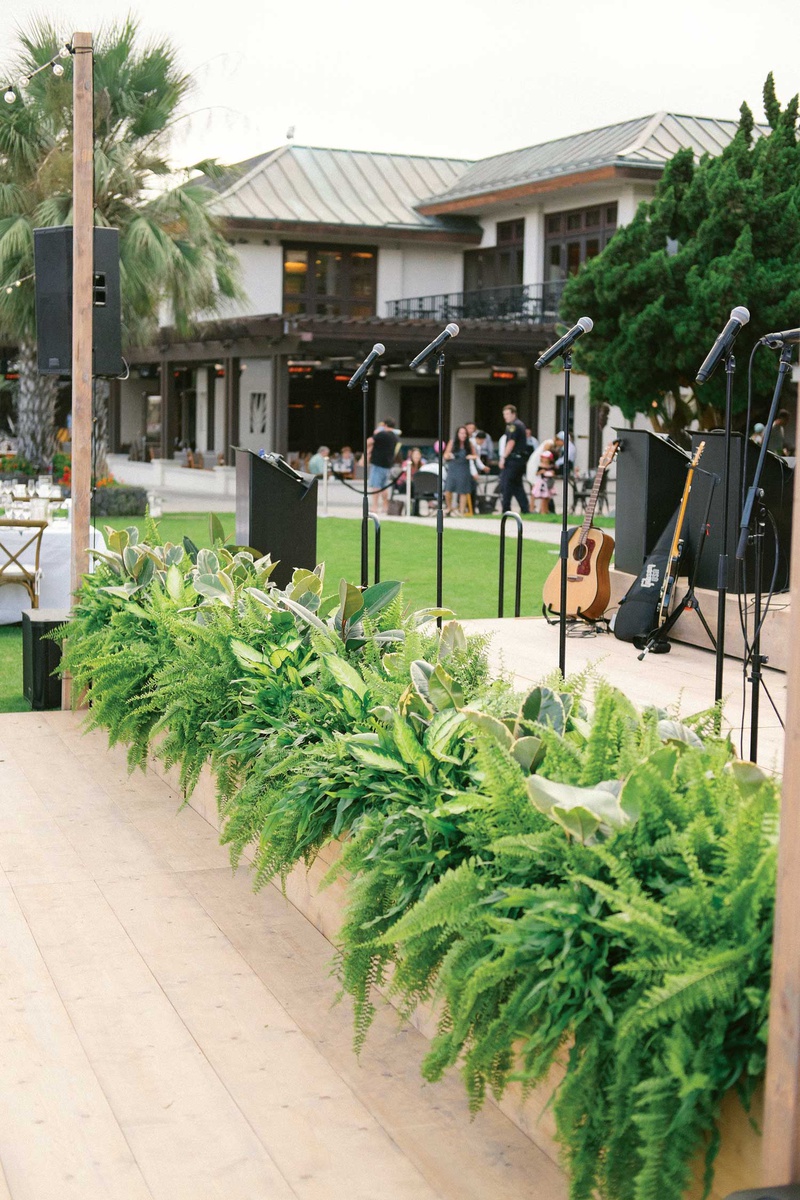 Entertainment Photos - Tropical Greenery at Band Stage - Inside Weddings