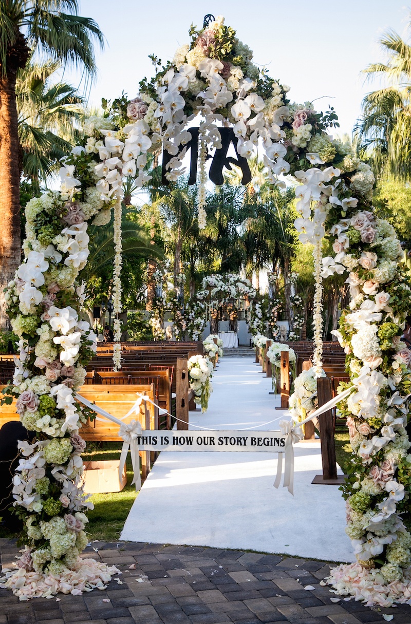 Ceremony Décor Photos - Dramatic Ceremony Entrance Arch - Inside Weddings