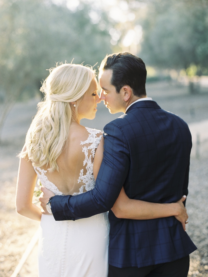 Couples Photos - Couple with Arms Around Each Other - Inside Weddings