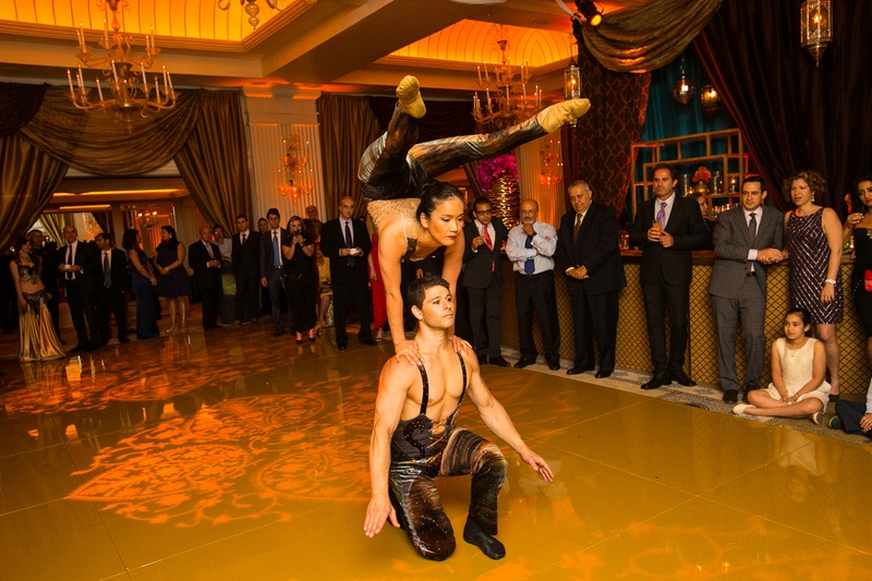 Showers & Parties Photos - Acrobatic Duo on Dance Floor - Inside Weddings